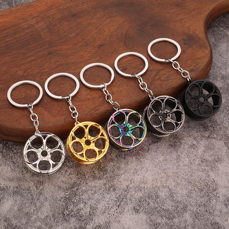 Creative rim key chain Men's metal car key Speed transmissio - TikTok Shop