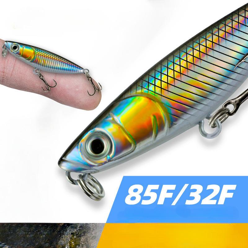 Outdoor fishing colorful fishing hooks and bait, small minnows ...