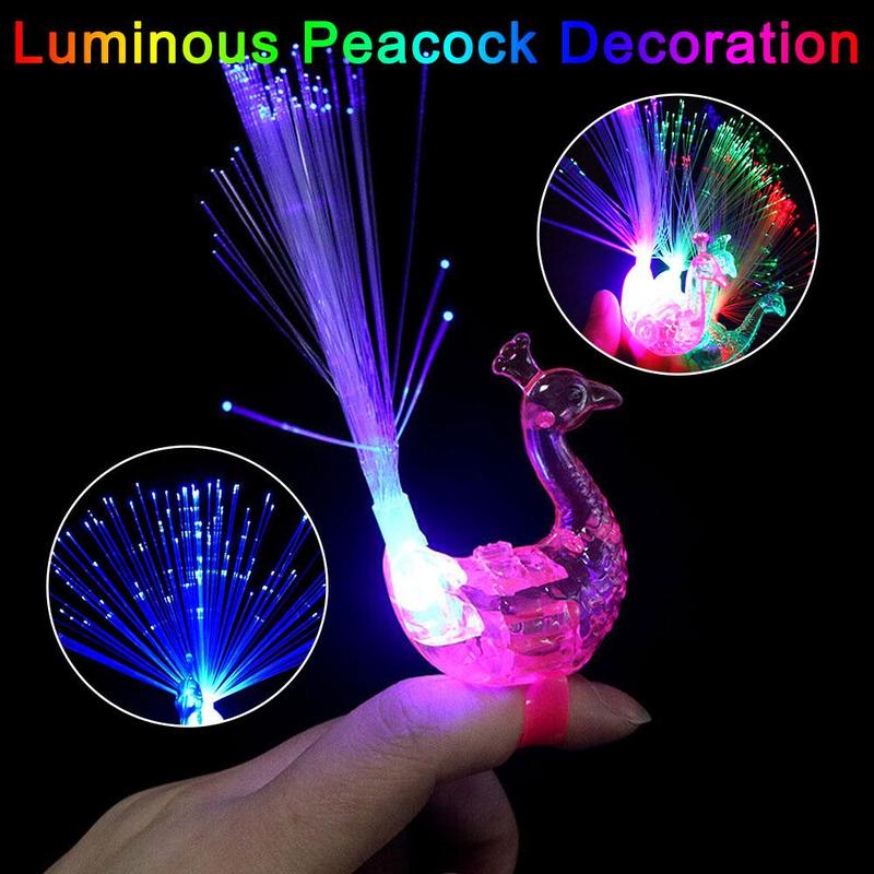 Light-up LED Magic Glow Peacock Finger Light Beams Rings Optical ...