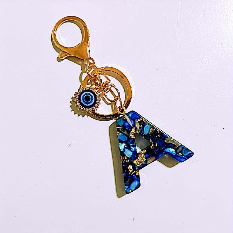 Rantai Kunci Permulaan Resin Mata Jahat Biru, Huruf Nada Ema - TikTok ...