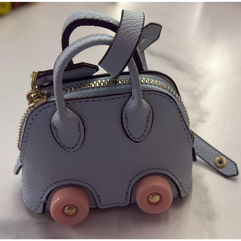 Bag Charm - wheels on the bag - TikTok Shop Singapore