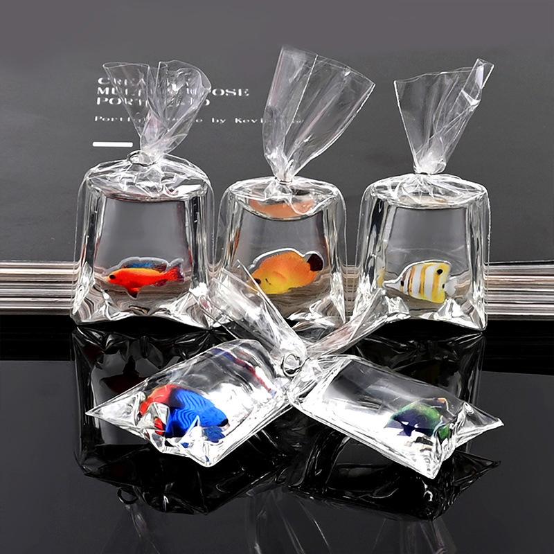Rantai kunci resin ikan emas, azimat ikan kecil dalam beg air, - TikTok ...