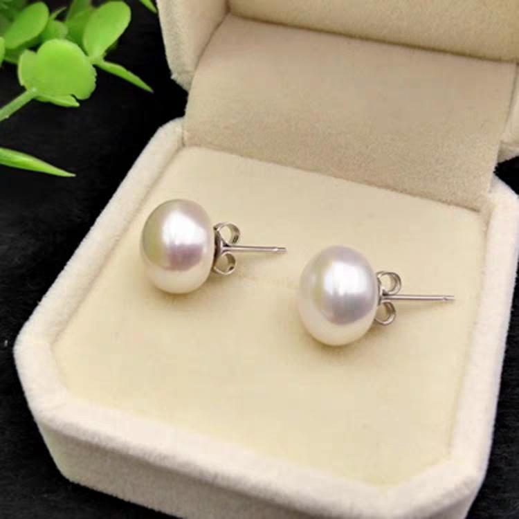 A pair of steamed bun earrings (one person is limited to one single ...