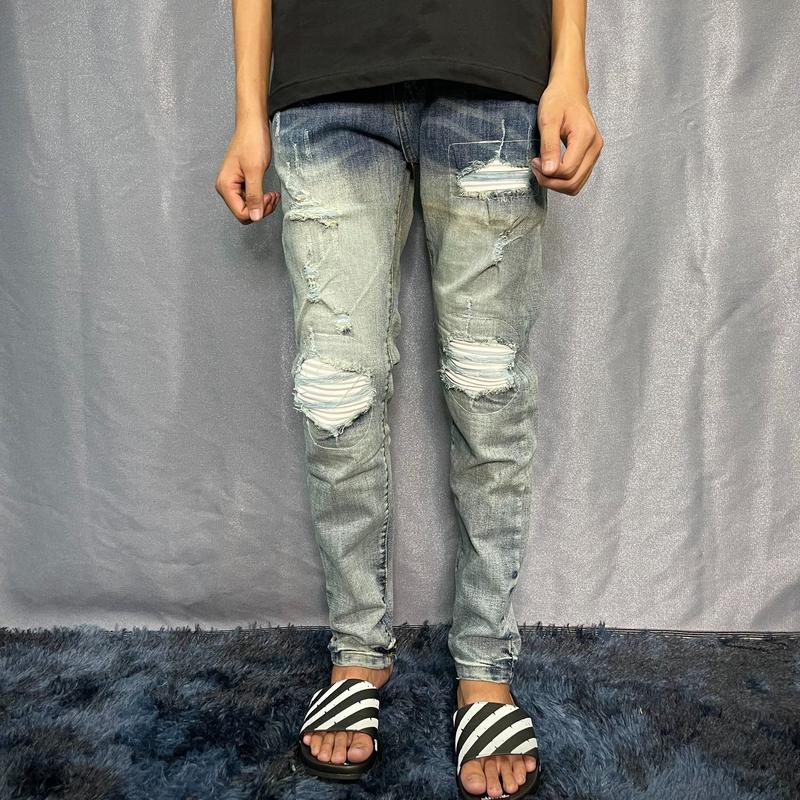 Quần jean xanh loang vá da,vá vải trắng vá thêu viền vòng quanh ...